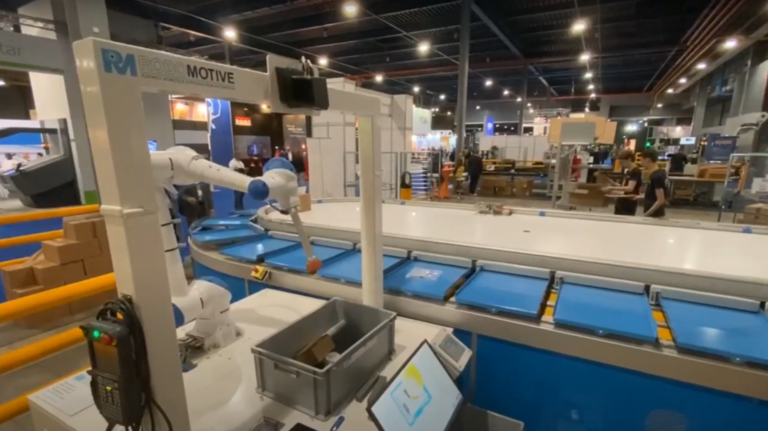 Cobot item pick from tote to sorter | Robomotive